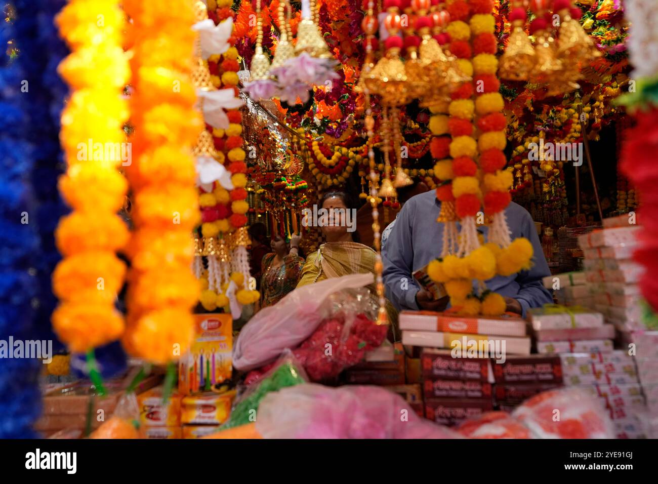 Women shop on the eve of Diwali, the Hindu festival of lights, in Jammu ...