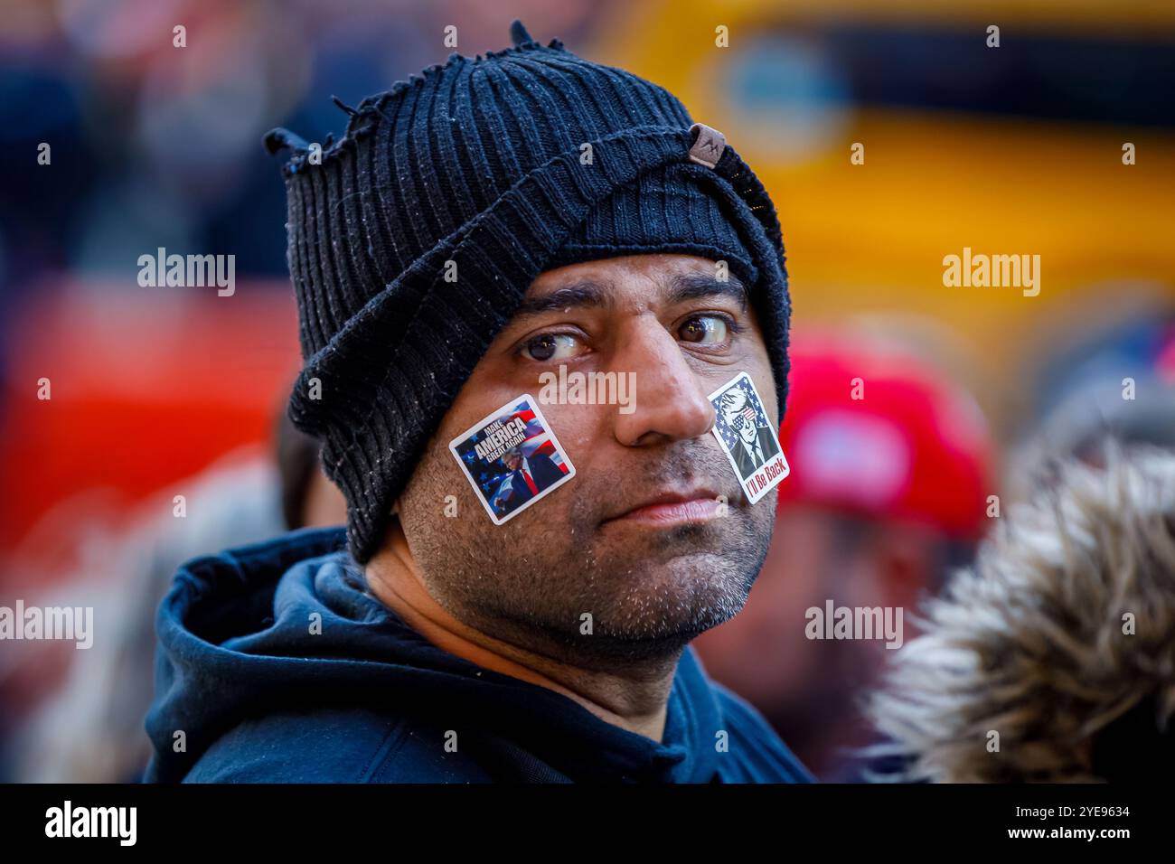 New York, New York, USA. 27th Oct, 2024. A Trump supporter wears ...