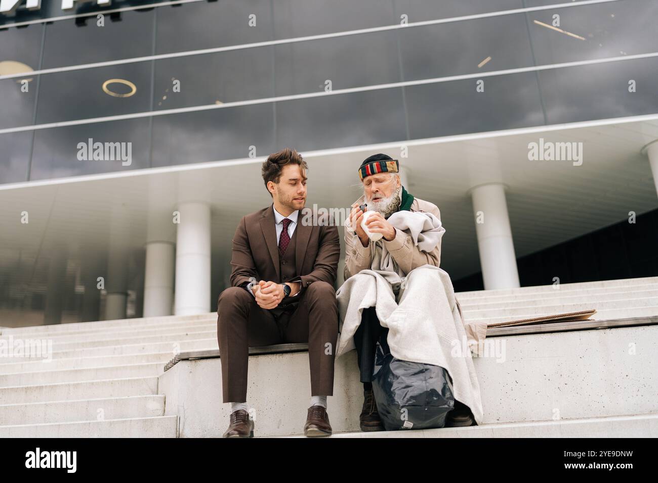 Low-angle view of compassionate professional in business attire ...