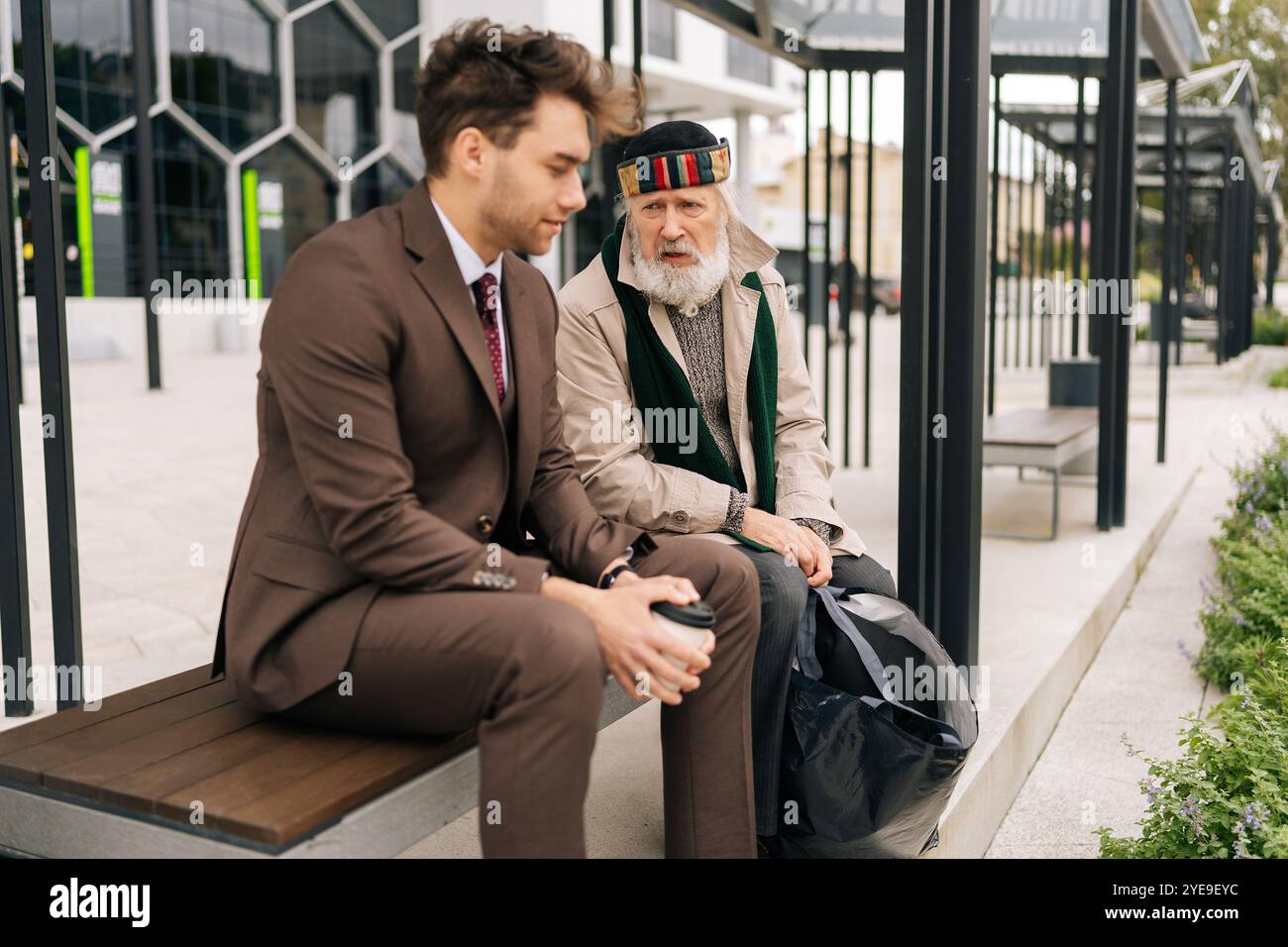 Homeless young male suit hi-res stock photography and images - Alamy