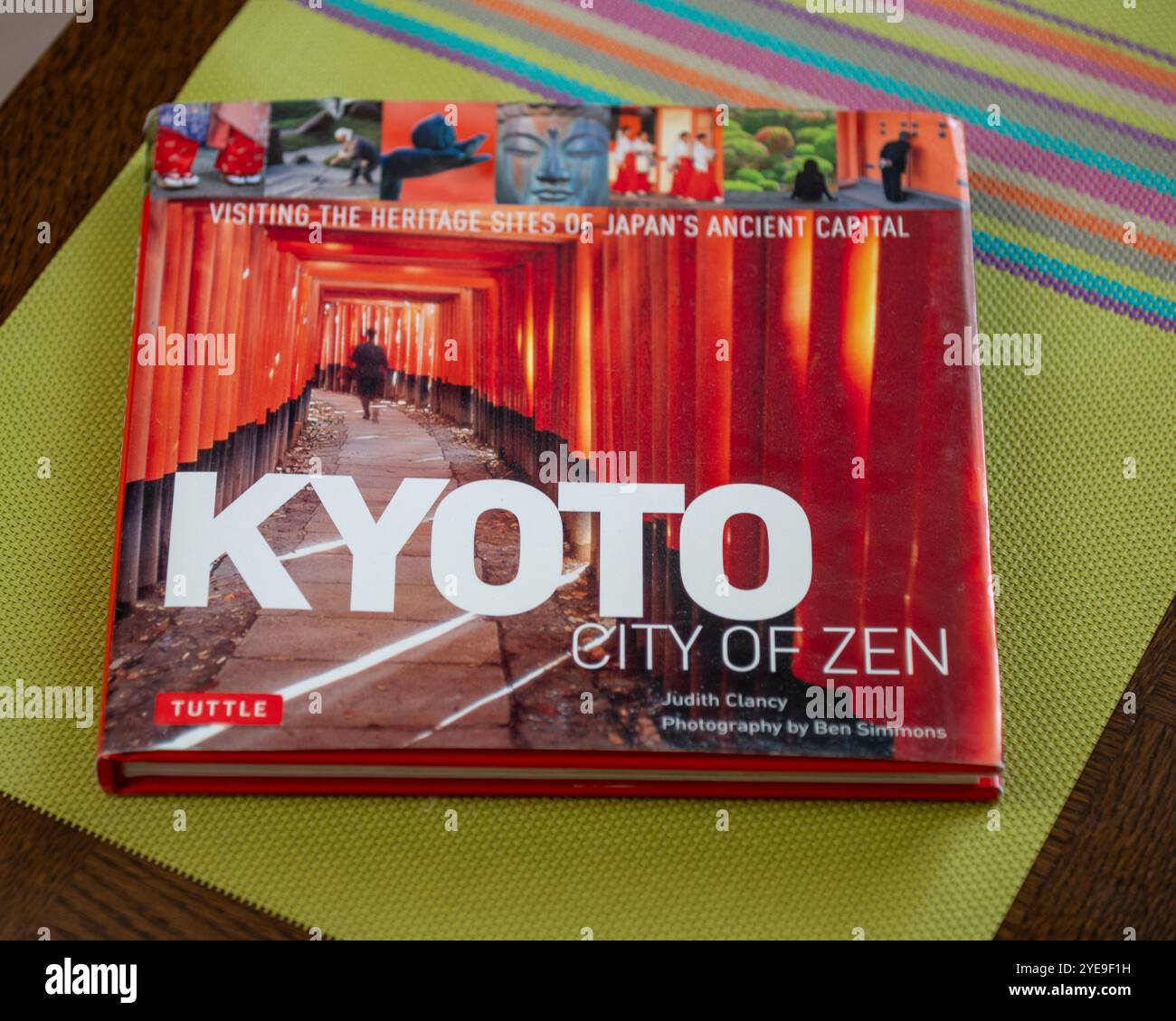 Tuttle Kyoto City of Zen travel guide and coffee table book on the table. Planning journey to ...