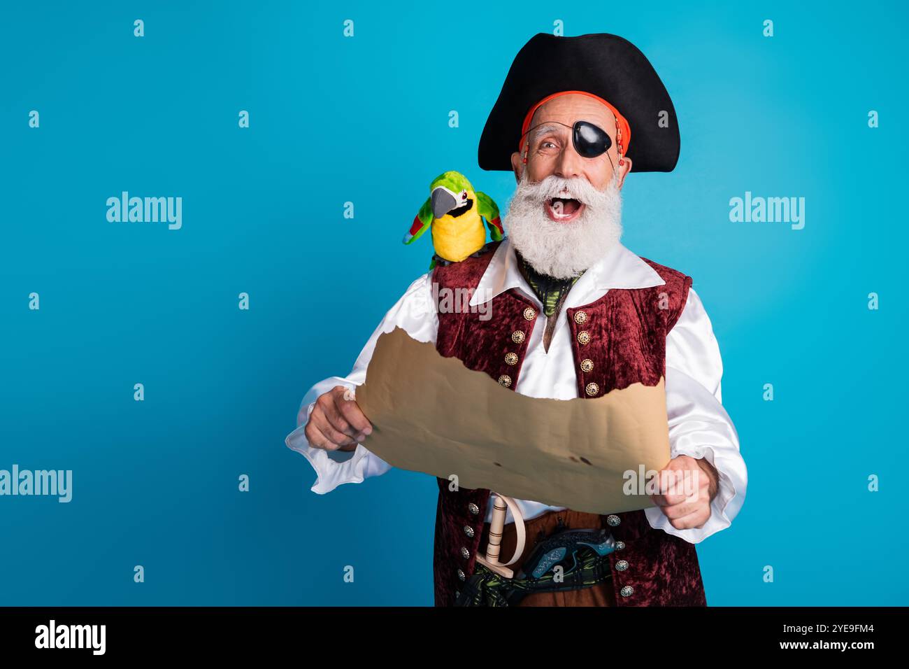 Photo portrait of senior funny pirate grandpa excited hold treasure map ...