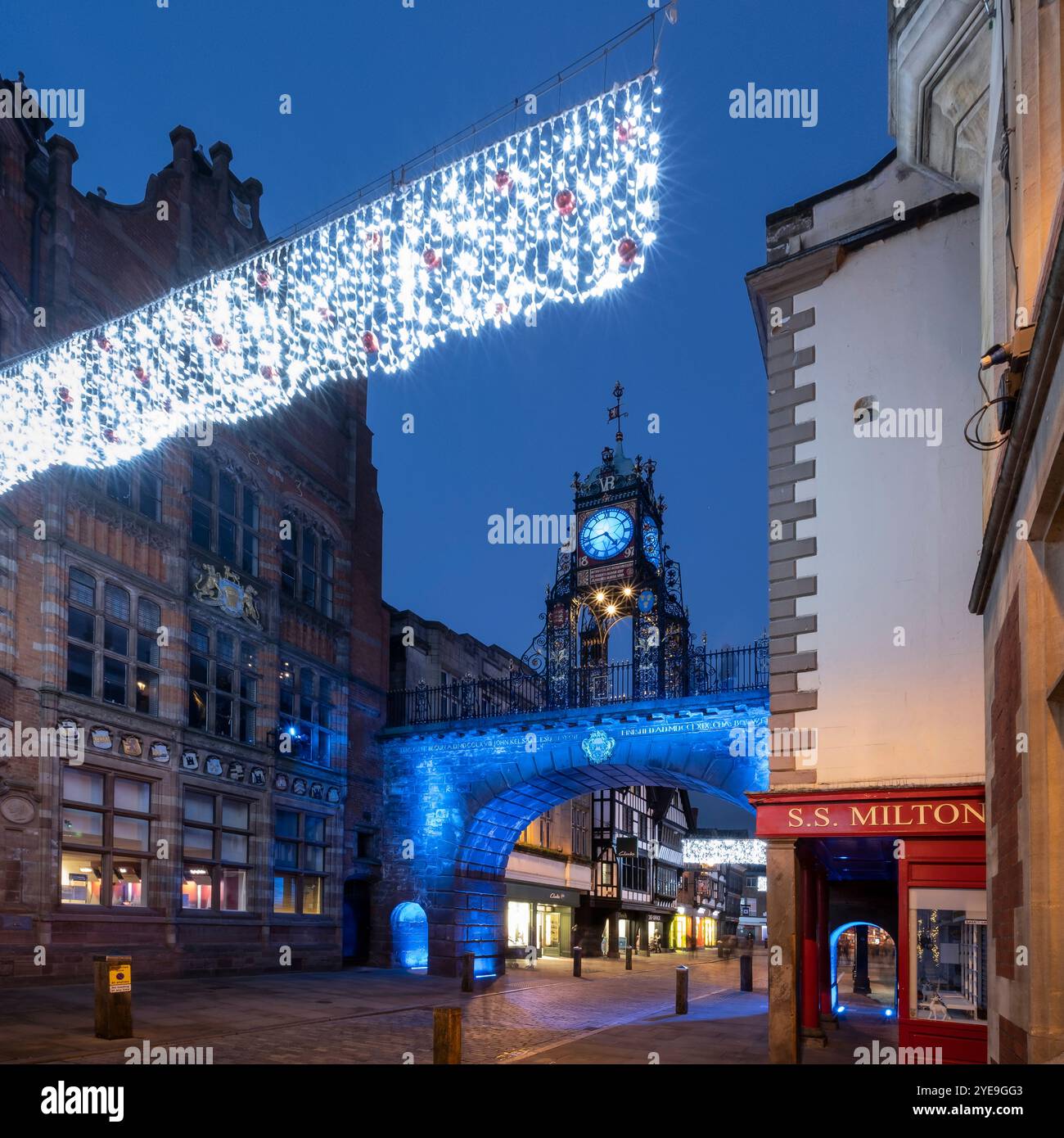 The Eastgate Clock and Eastgate Street at night at Christmas, Chester ...