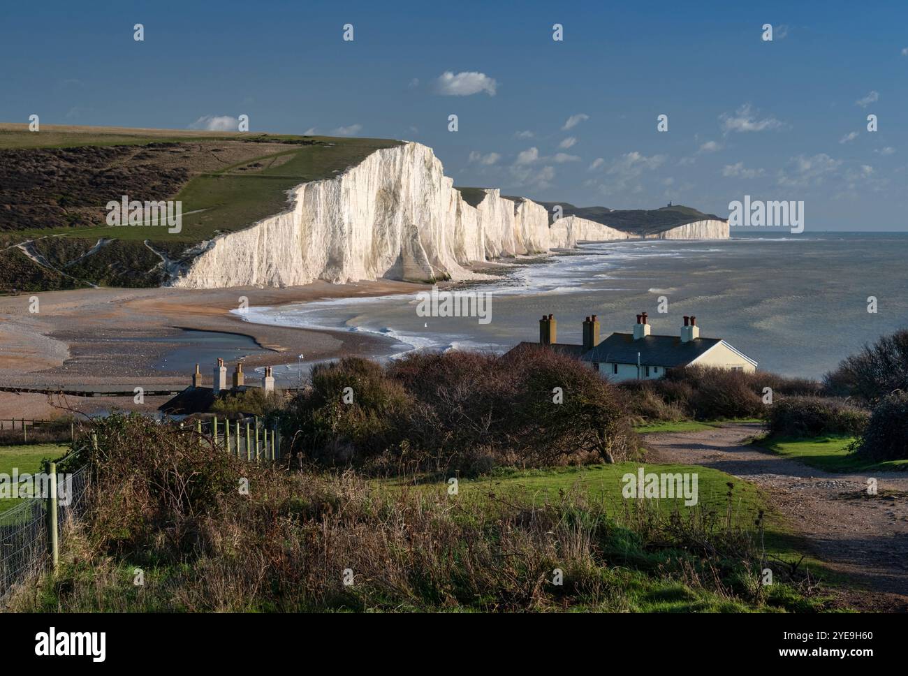 The Seven Sisters white chalk cliffs from Cuckmere Haven, South Downs ...