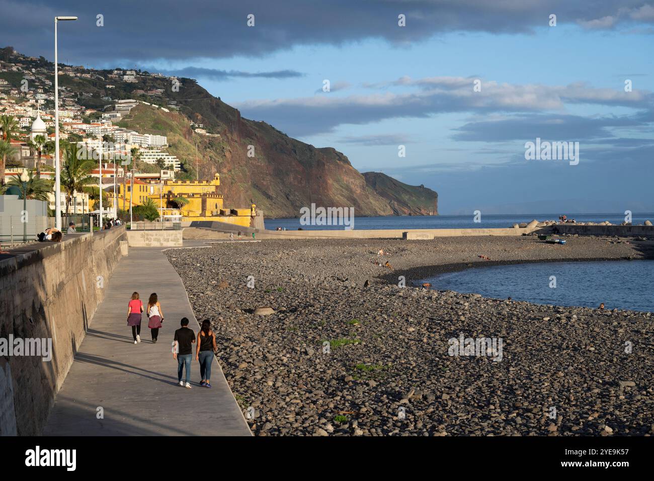 Promenade along the waterfront in the coastal town of Funchal, Madeira ...
