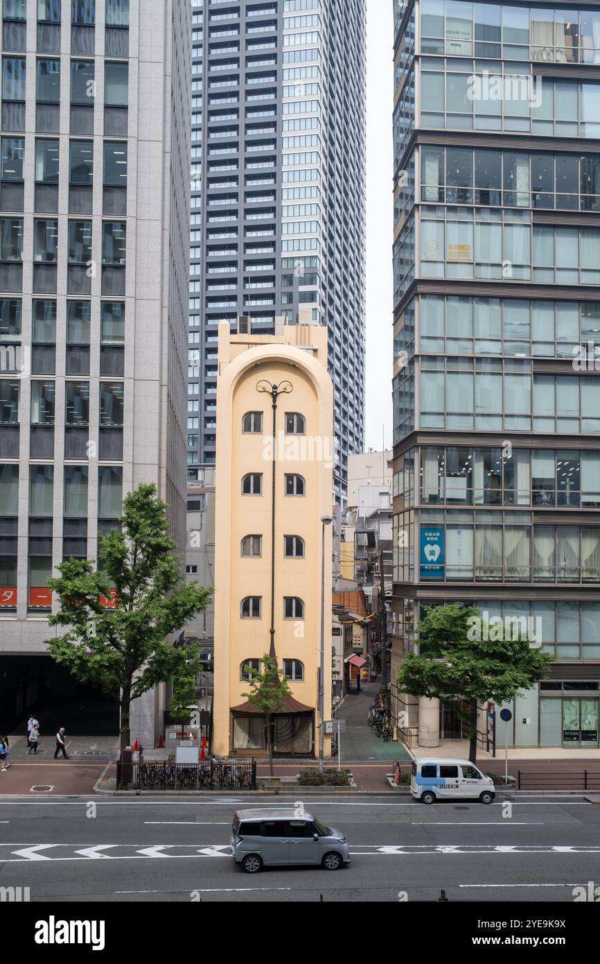 Tall Narrow Building in Osaka Japan Stock Photo - Alamy