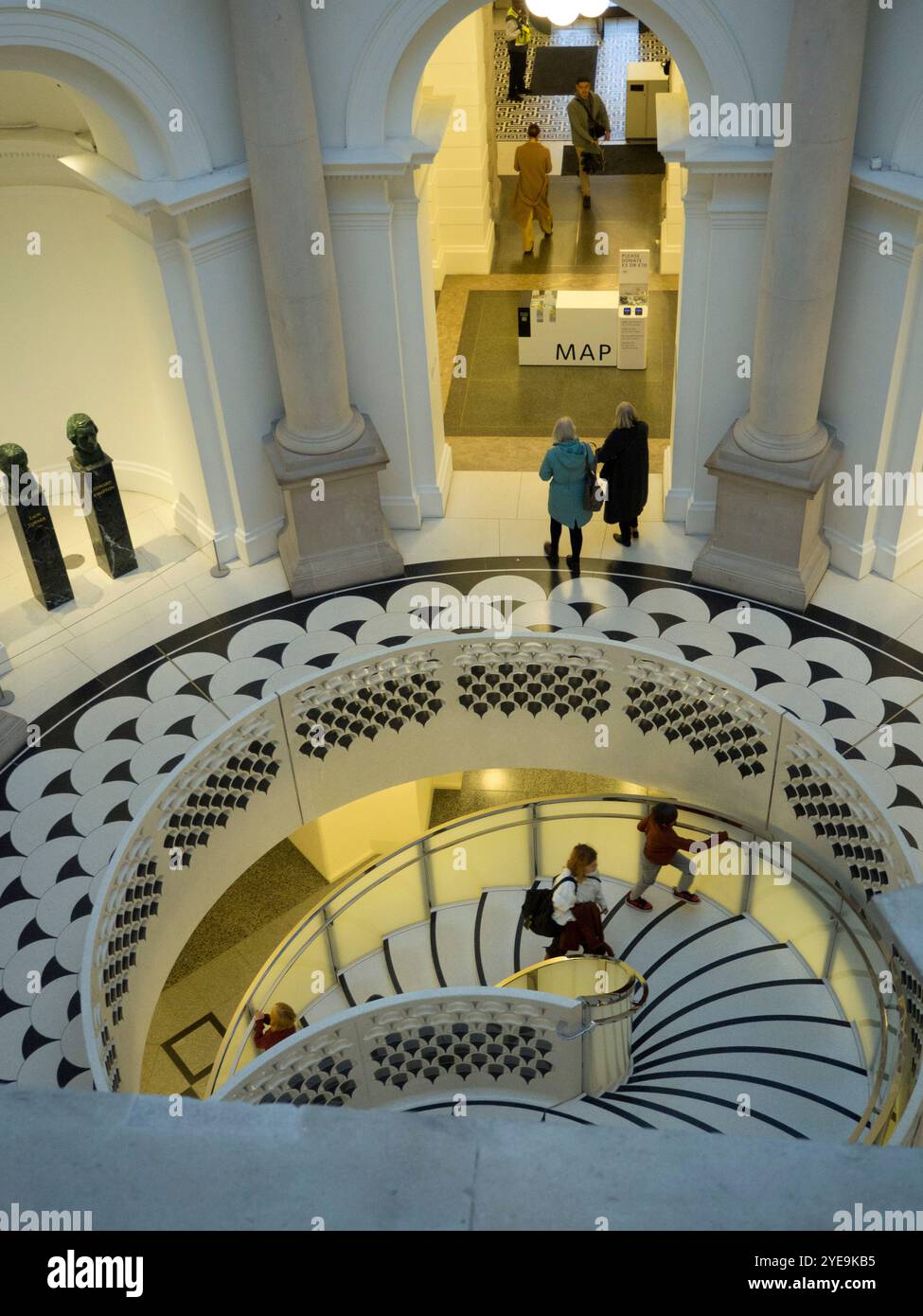 Spiral staircase seen from a vantage point inside an art museum in ...