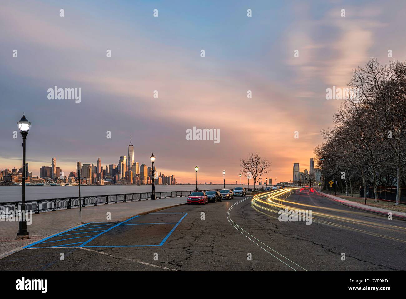 Lower Manhattan and Jersey City skylines at sunset viewed from Hoboken ...