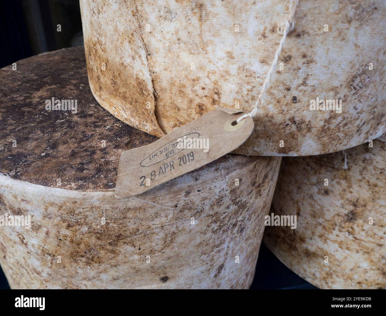 Wheels of mature cheddar cheese with label, Neal's Yard Dairy, Borough ... Wheels of mature cheddar cheese with label, Neal's Yard Dairy, Borough ...