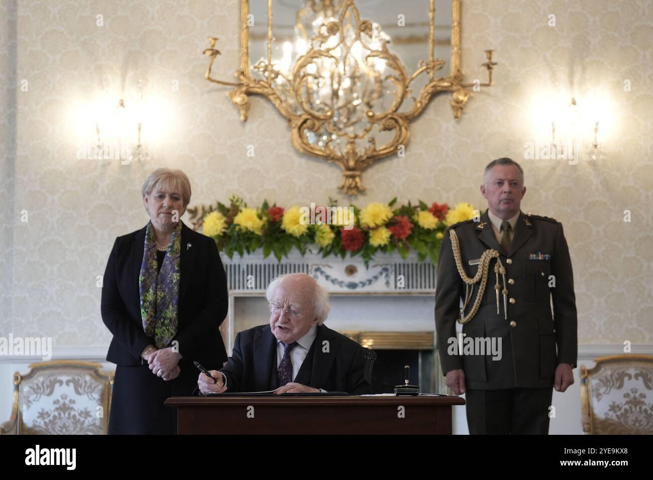 President Michael D Higgins signs a Presidential pardon for Sylvester ...