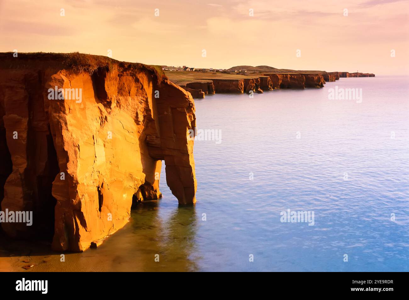 Sandstone cliffs at La Belle Anse, Grindstone Island at sunset ...
