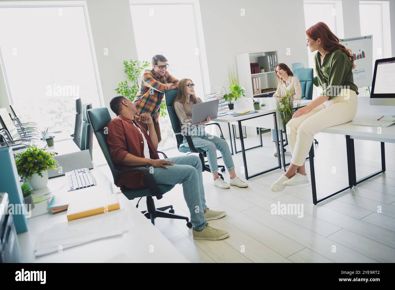 Photo of positive good mood young specialists creating start up ...