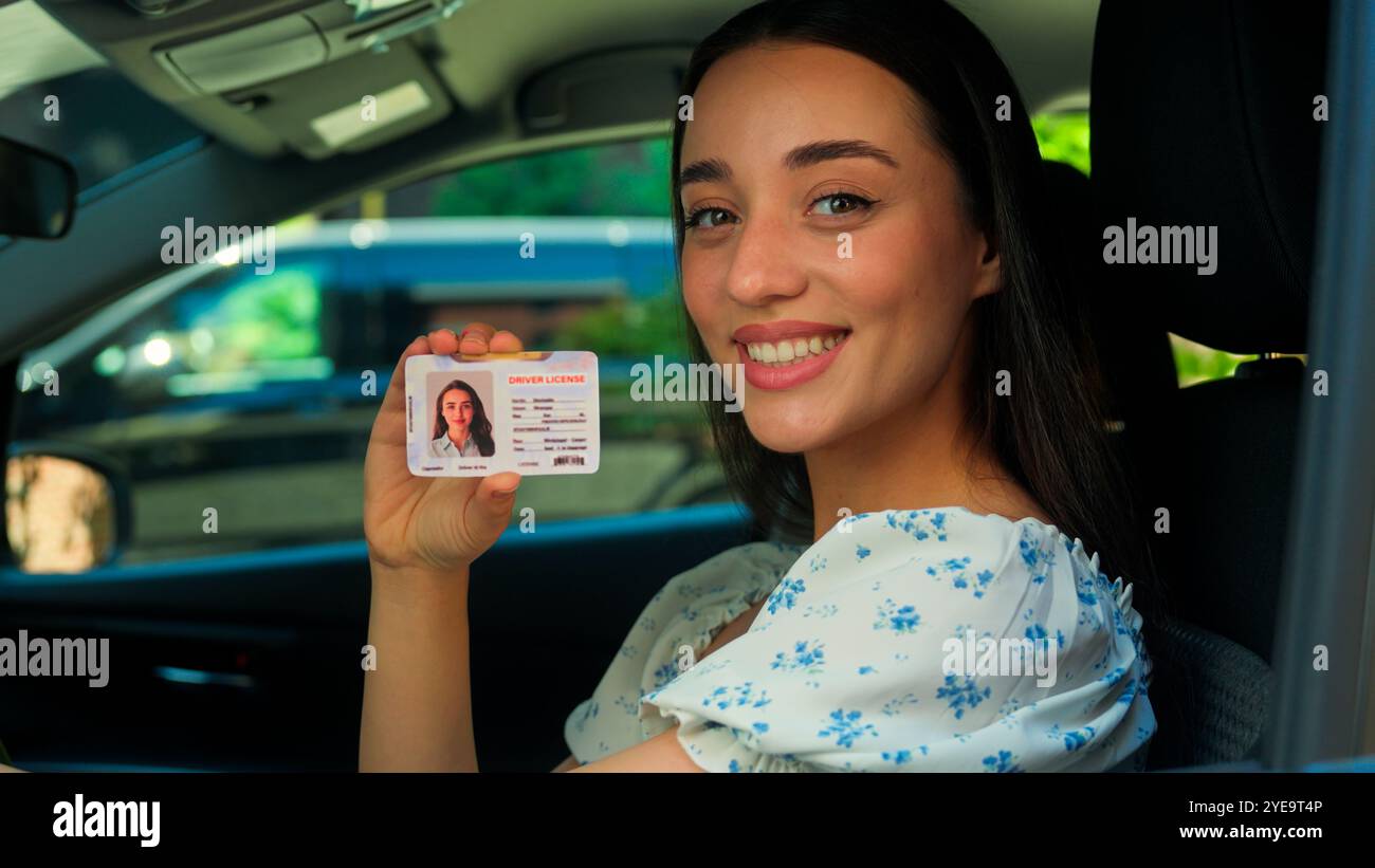 Happy smiling Caucasian joyful girl woman female driver sitting inside ...