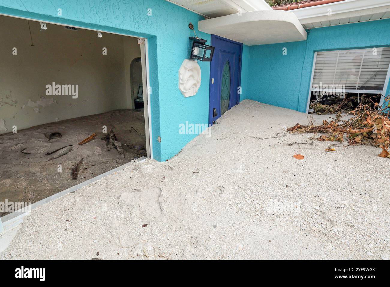 FILE - Sand washed ashore by the surge of Hurricane Helene fills a ...