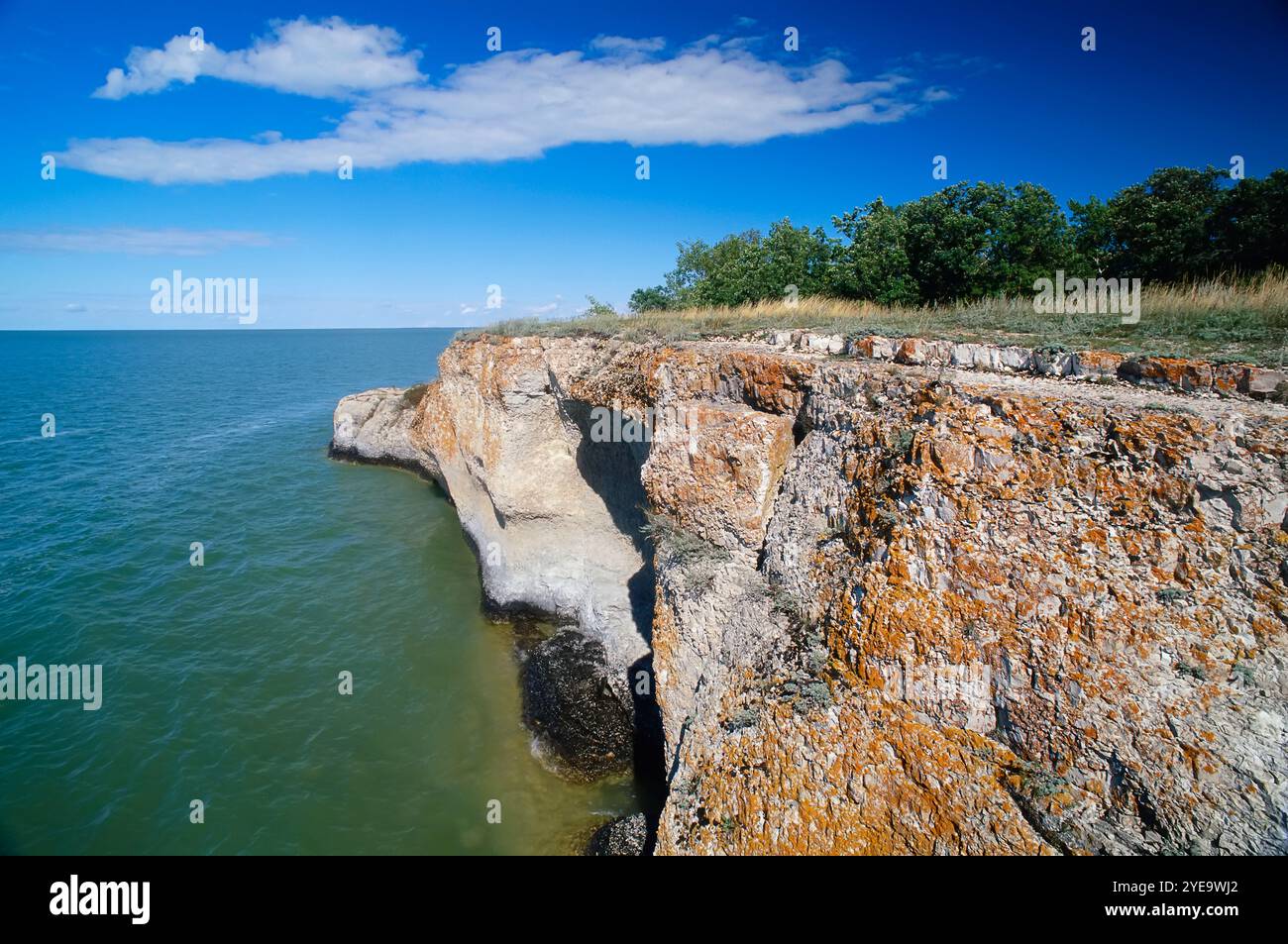 Rugged limestone cliffs on the shoreline of Lake Manitoba in Manitoba ...