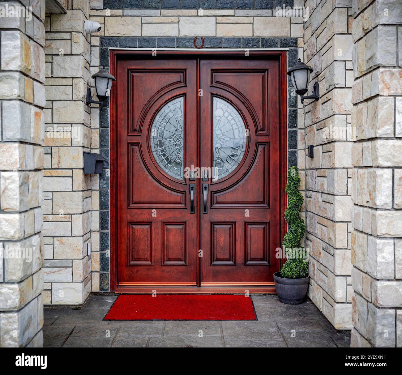 Double doors at a home's front entrance; Surrey, British Columbia ...