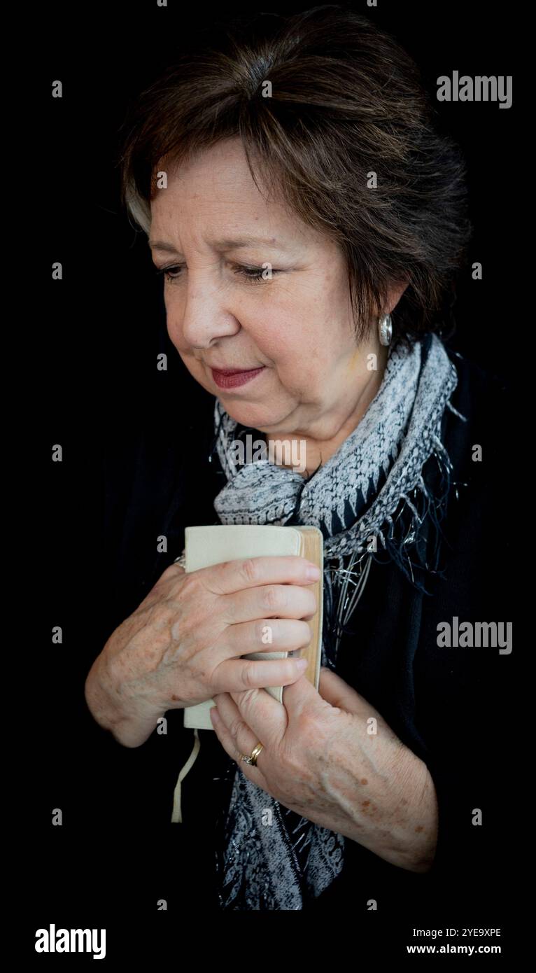 Christian holding bible hi-res stock photography and images - Alamy