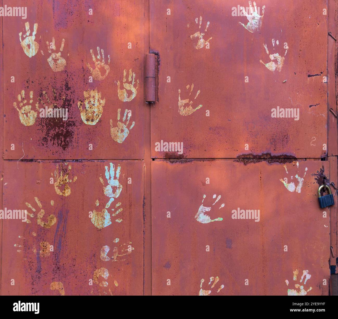 Hand print on rusty door hi-res stock photography and images - Alamy