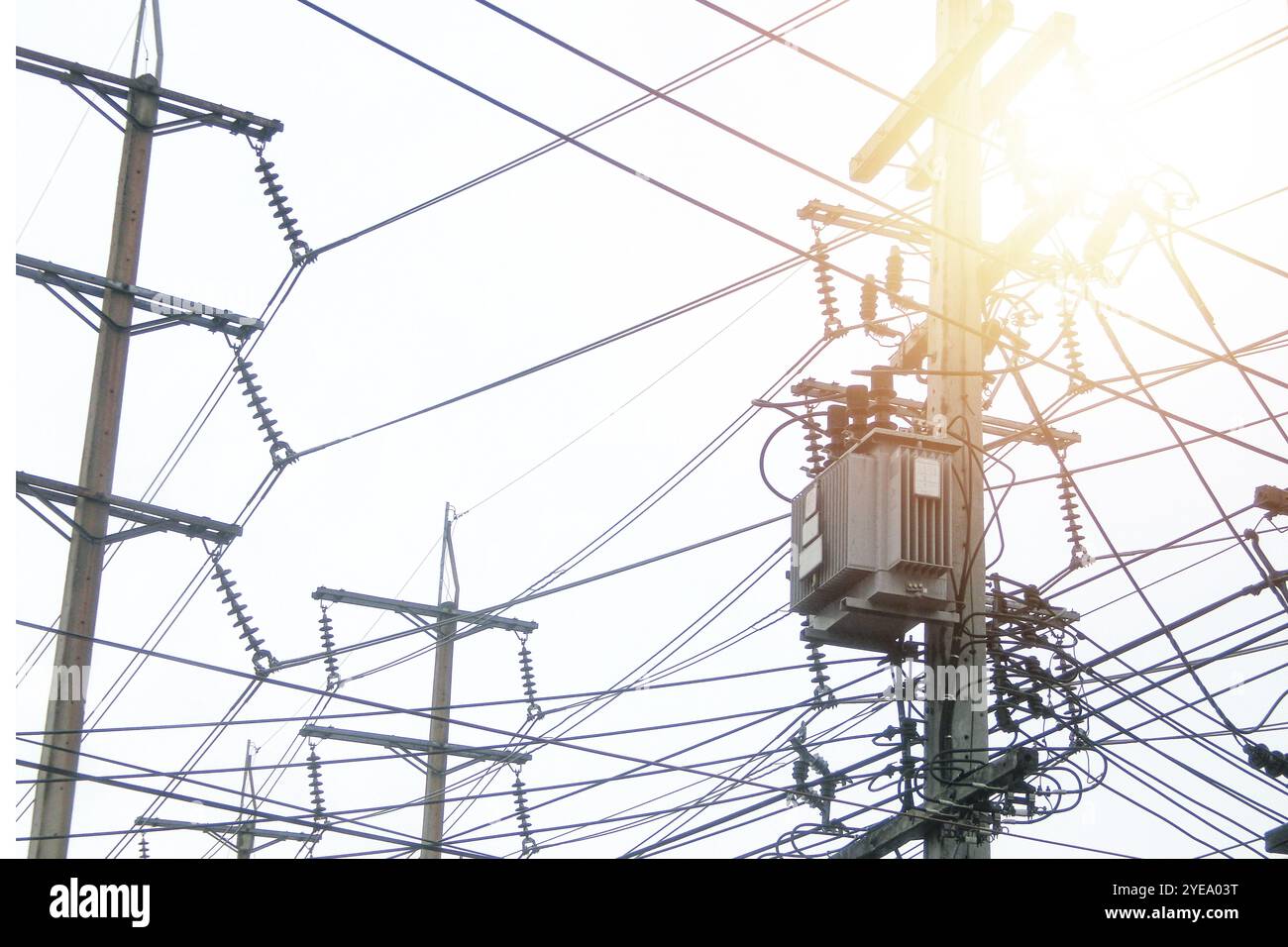 Large power transformers mounted on poles Stock Photo - Alamy