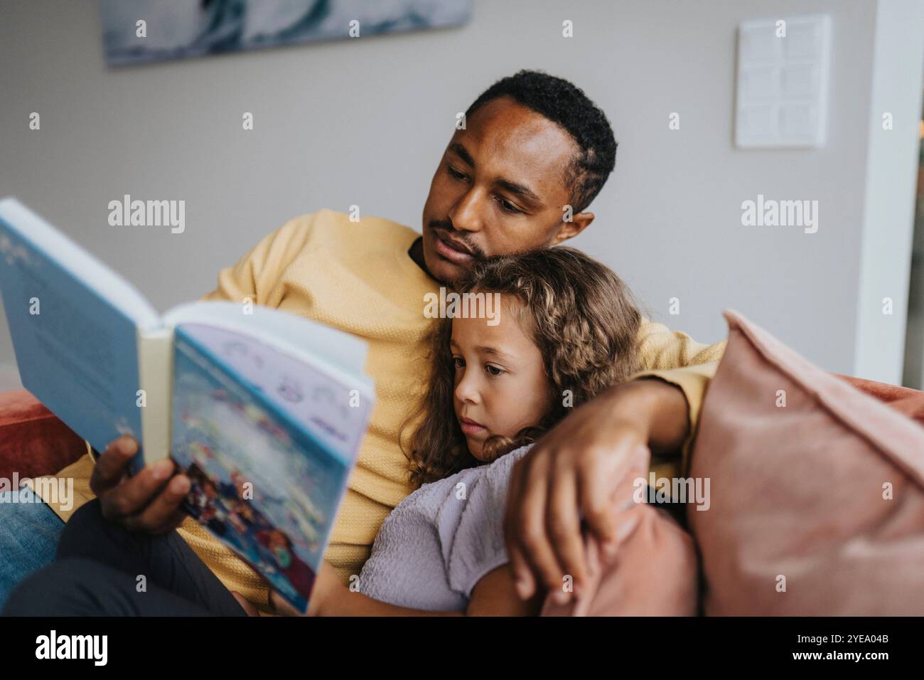 African american daughter reading hi-res stock photography and images ...