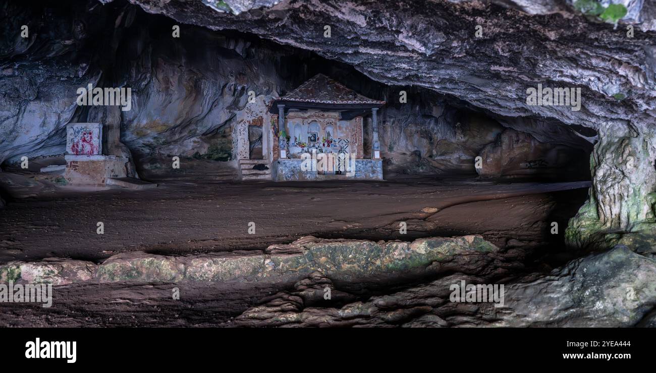 Religous altar in the Cave of Lapa de Santa Margarida; Sao Lourenco ...