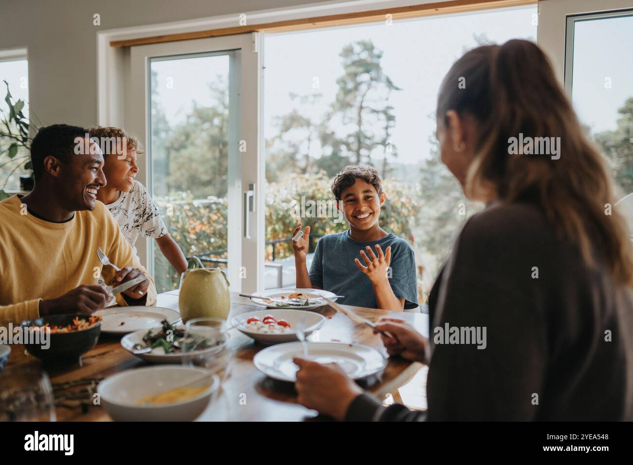 Family members having lunch on hi-res stock photography and images - Alamy