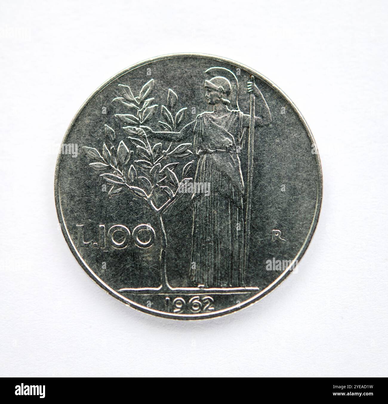 Reverse side of an Italian 100 lire coin dated 1962. The lira was the ...