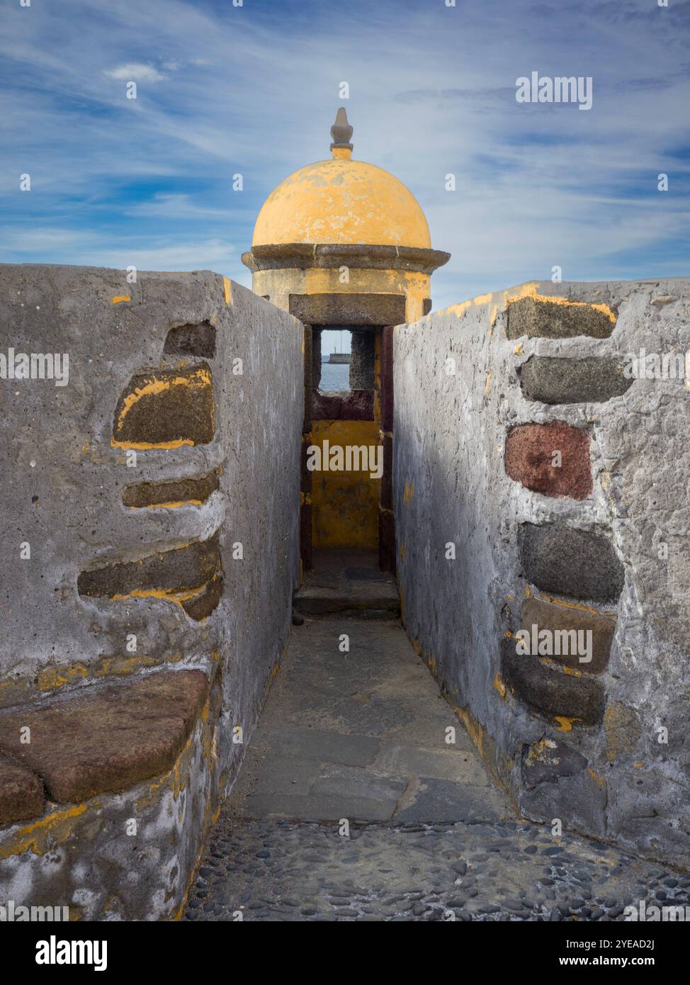 Architectural detail of a weathered watchtower and stone wall at the ...