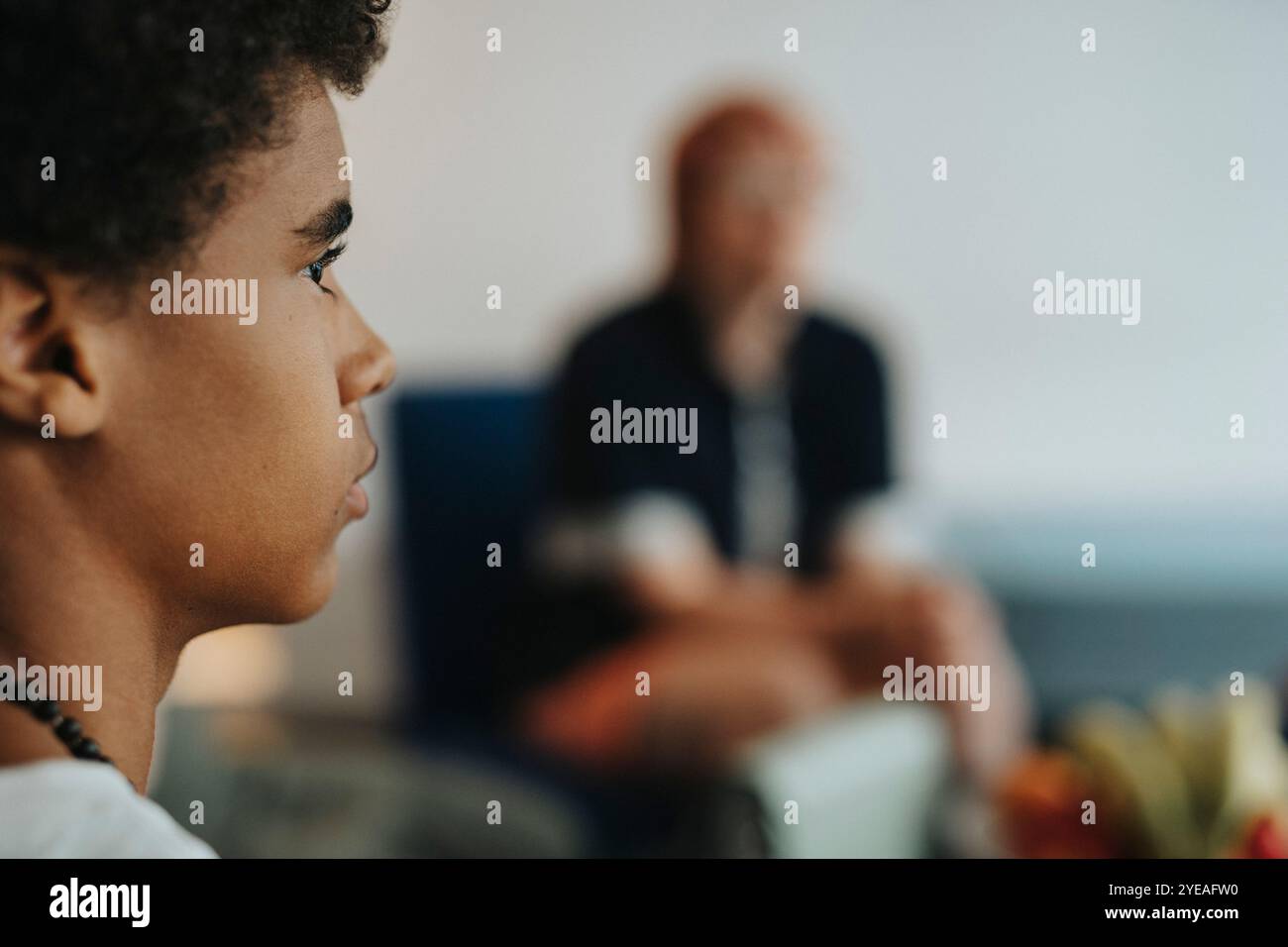 Side view of teenage boy at high school Stock Photo - Alamy