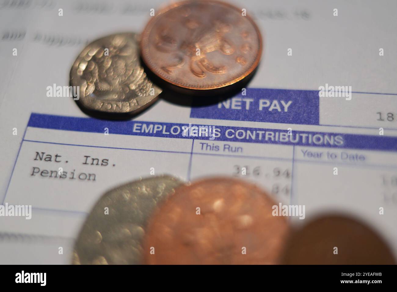 A worker's payslip showing details of their employers' national ...