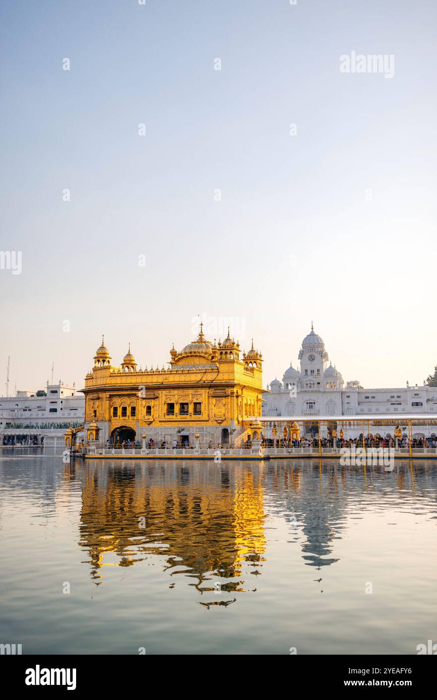 Golden Temple, a Sikh Gurdwara with the mirror image reflection in a ...