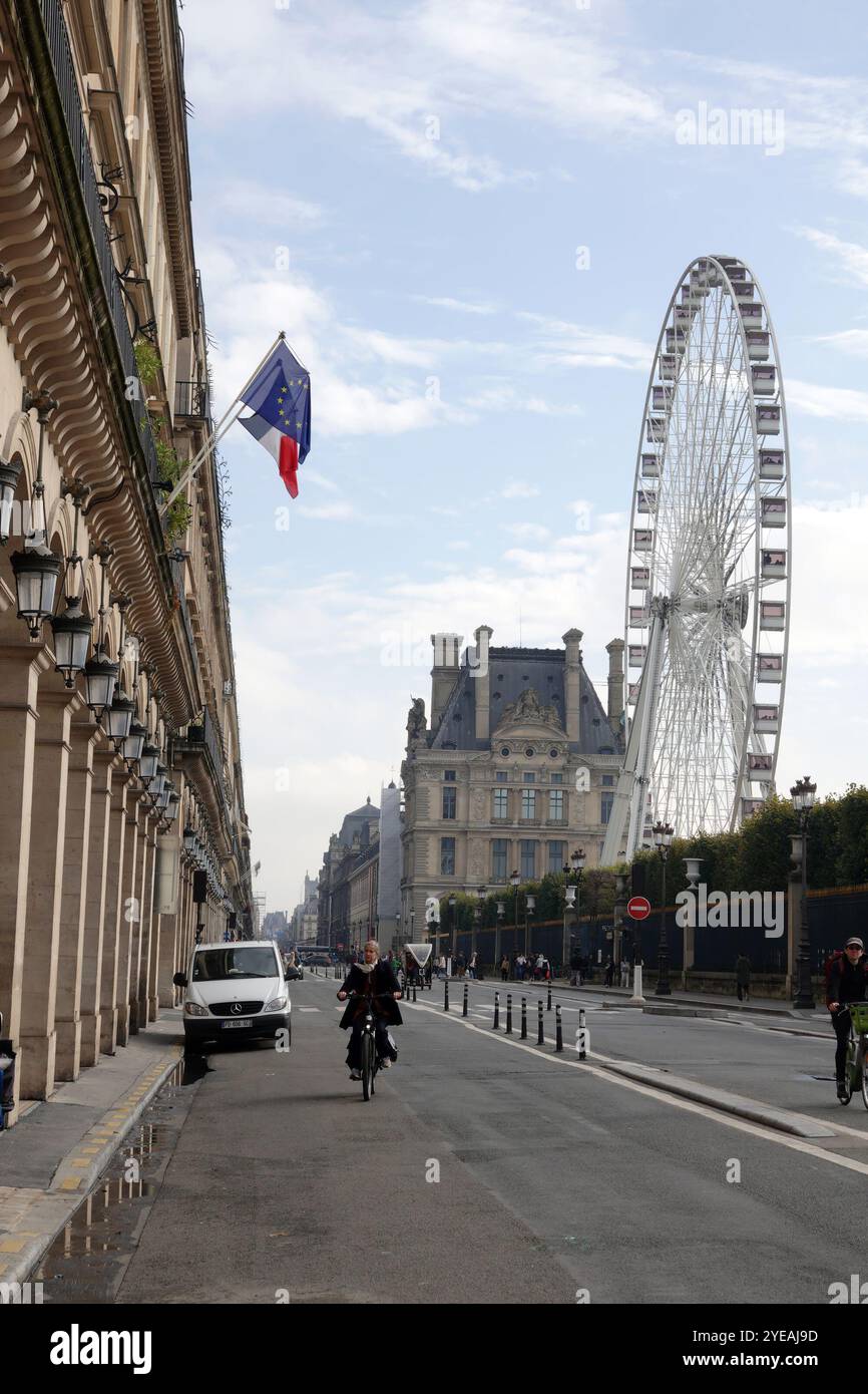 The Paris Ferris Wheel on the Place de la Concorde Louvre Museum, Paris ...