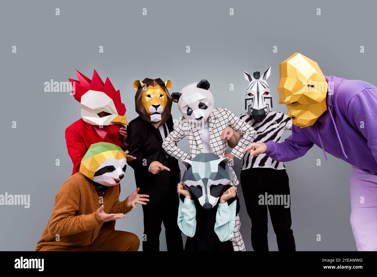 Photo of zebra gorilla lion panda sloth rooster mask people point ...