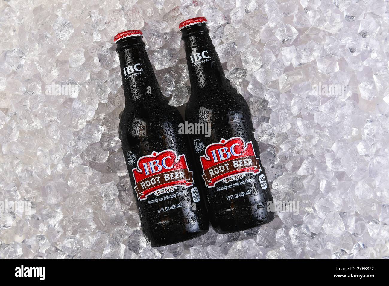 IRVINE, CALIFORNIA - 30 OCT 2024: Two bottles of IBC Root Beer on a bed ...