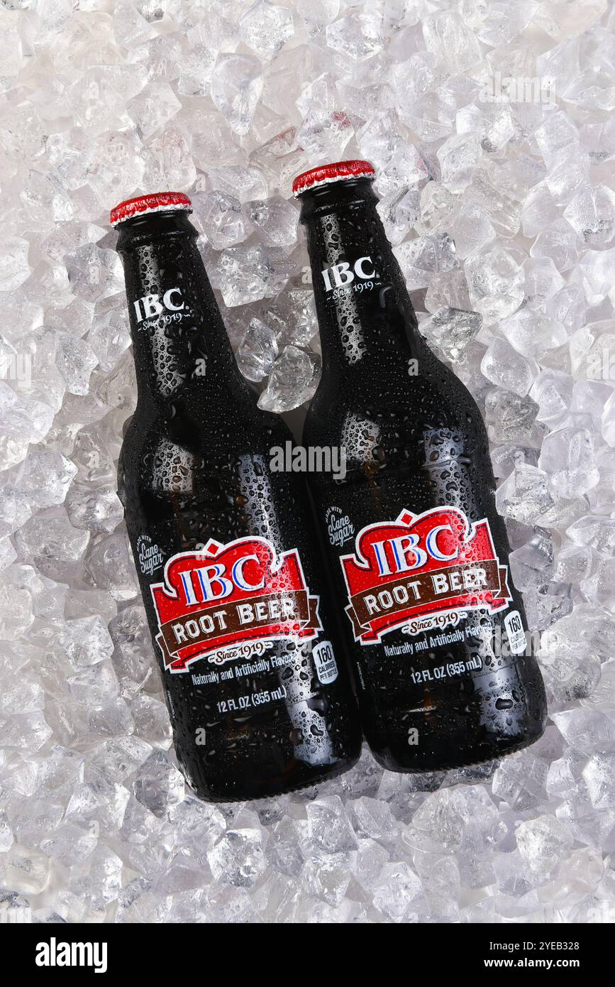 IRVINE, CALIFORNIA - 30 OCT 2024: Two bottles of IBC Root Beer on a bed ...