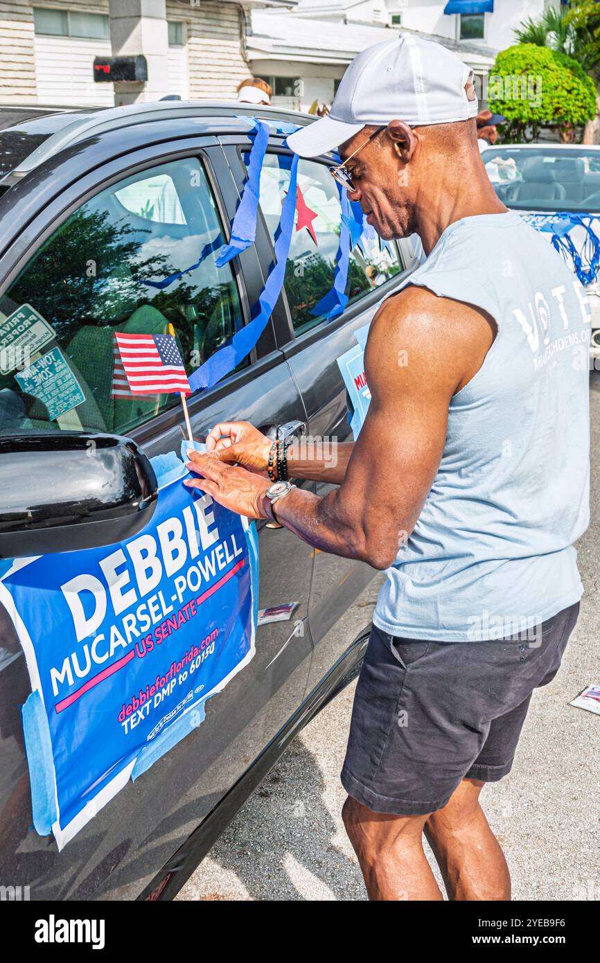 Miami Beach Florida,Democratic Club members,preparing vehicles cars ...