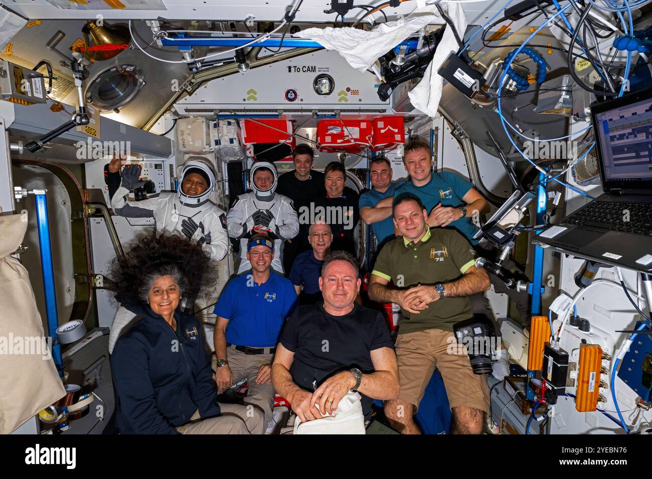 ISS - 23 October 2024 - The ISS Expedition 72 crew poses for a group ...