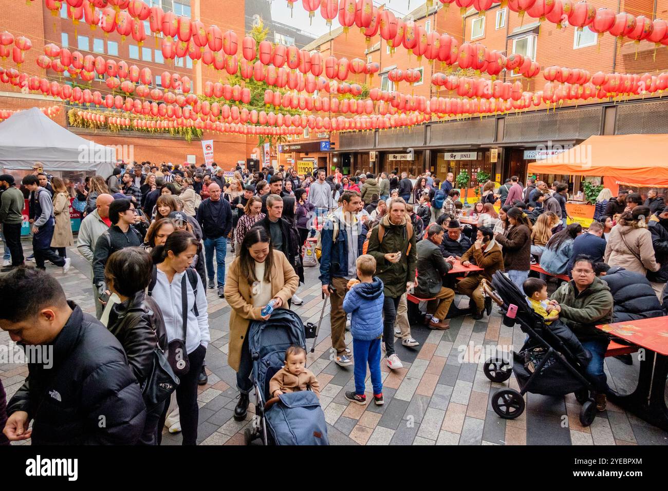 Busy Newport Place street food area of Chinatown, London, UK Stock ...