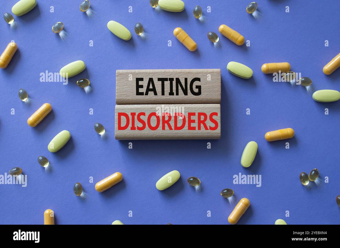 Eating Disorders symbol. Concept word. Eating Disorders on wooden ...