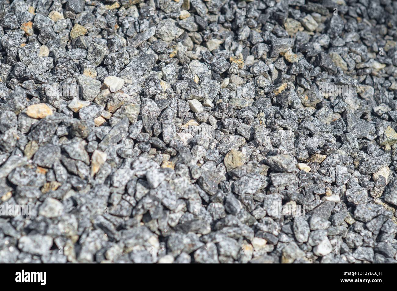 Fine gray crushed stone, textured background, full frame. Use as ...