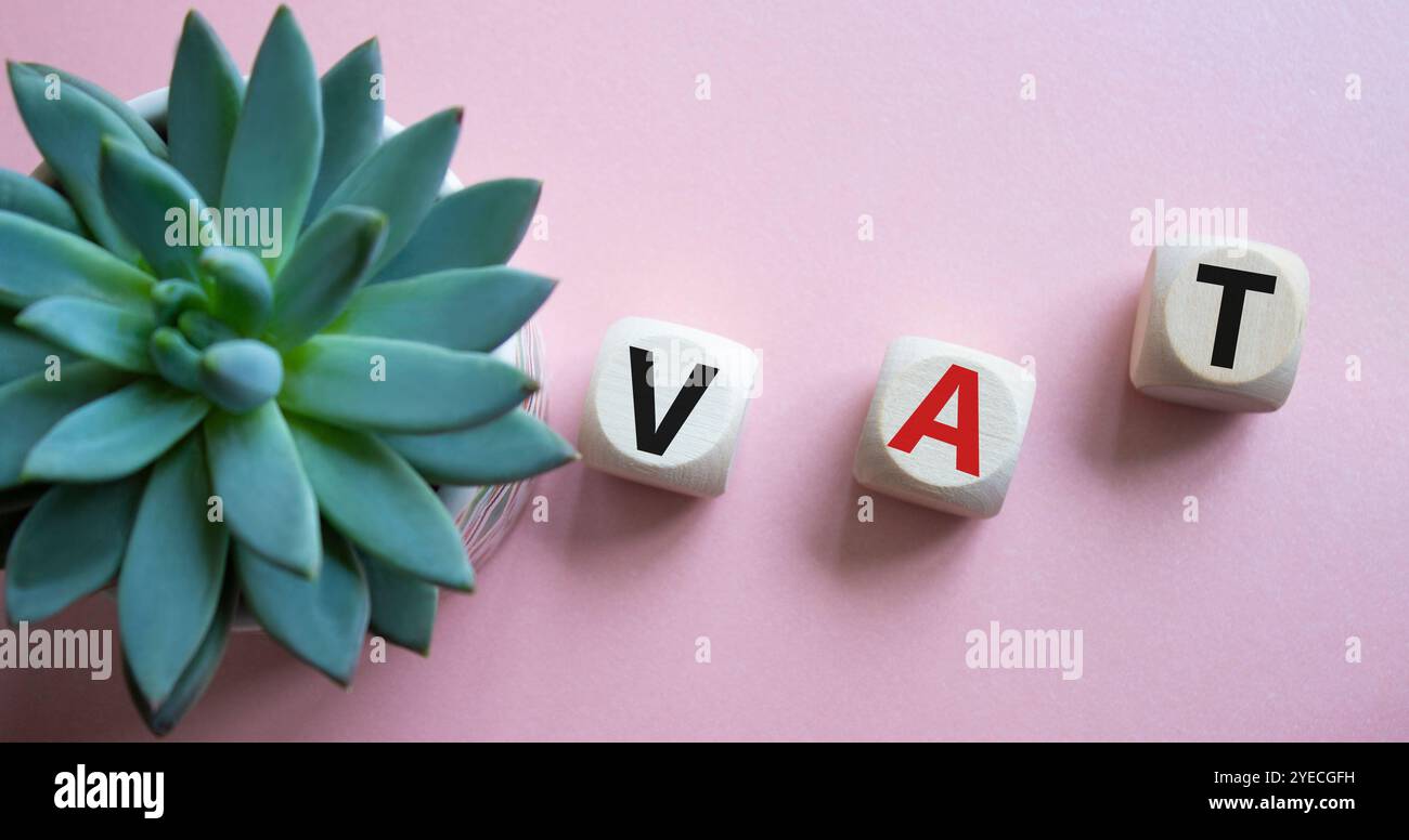 VAT - Value Added Tax symbol. Wooden cubes with word VAT. Beautiful ...