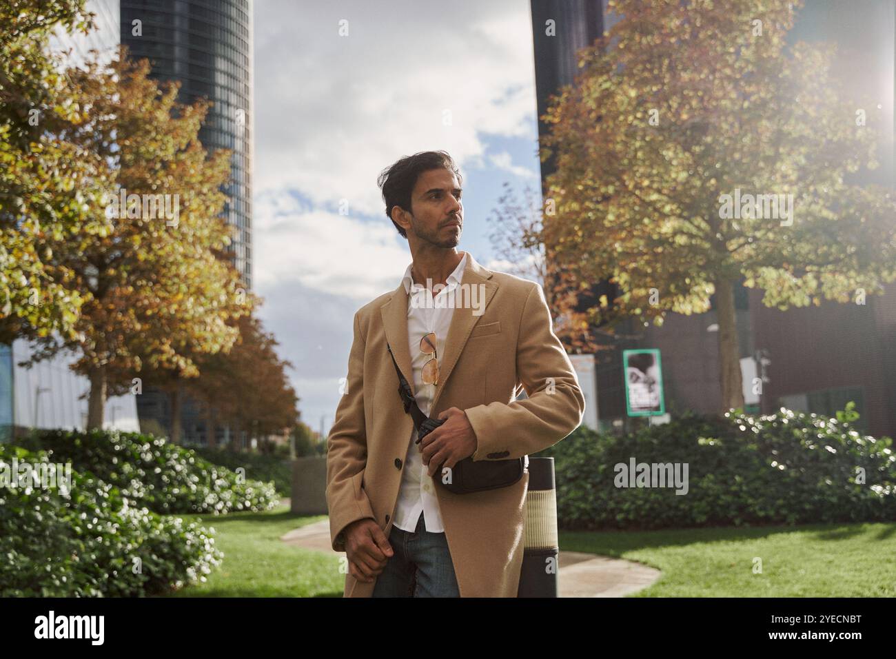 Portrait of a trendy urban Indian man. Urban man in street Stock Photo ...
