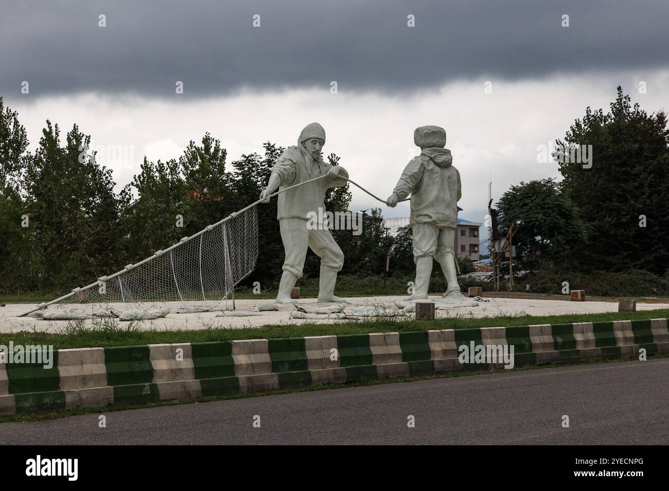 Paresar, Gilan Province, Iran - September 25, 2024: Two statues of men ...