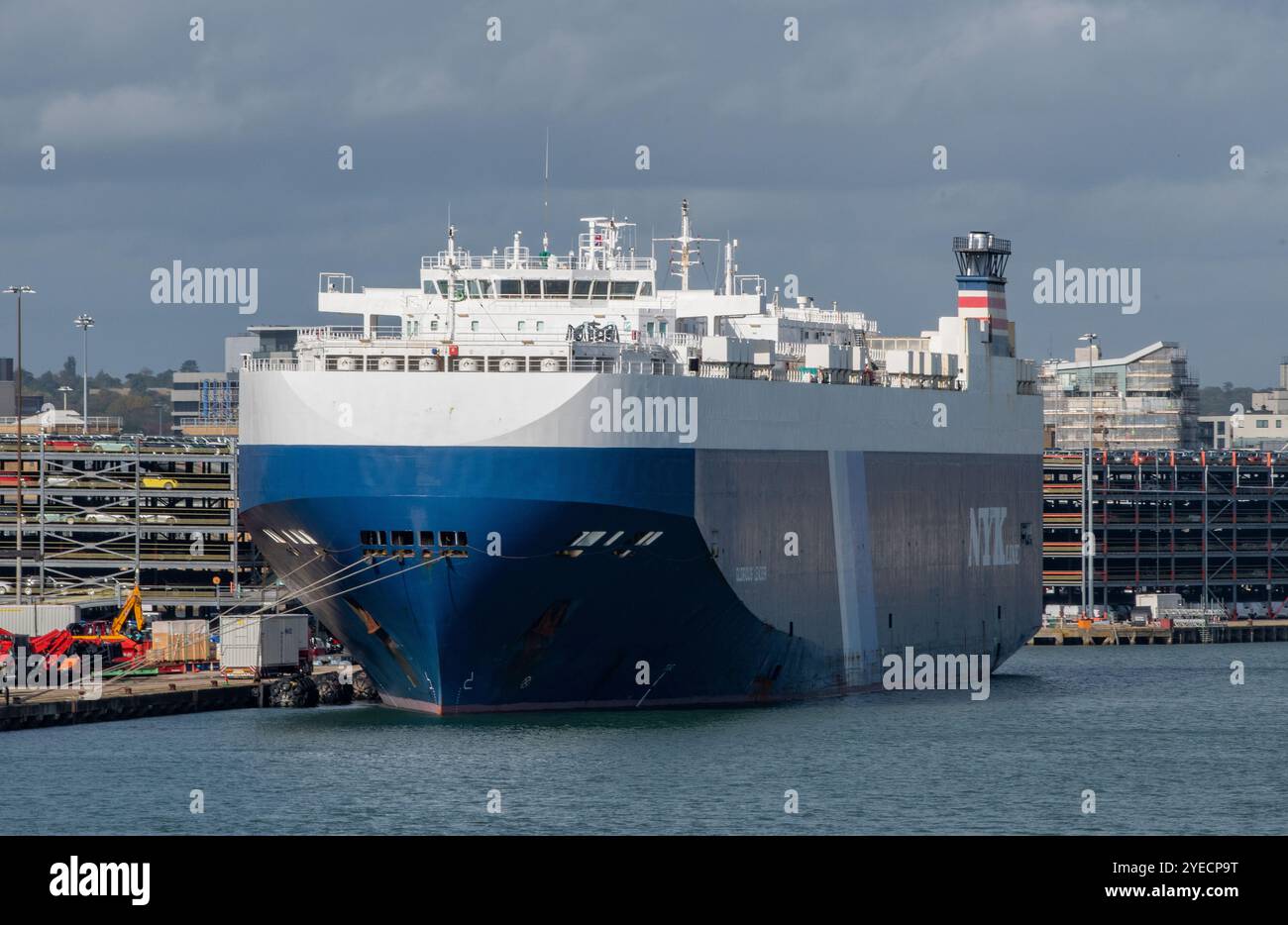 car transporter ship alongside in the docks in the port of Southampton ...