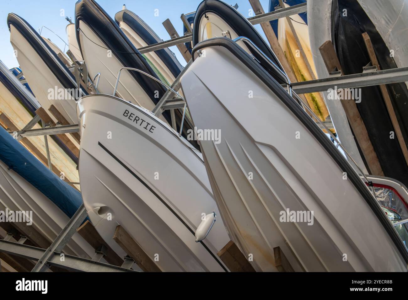 rigid inflatable boats stored in a dry stack storage system, small ...