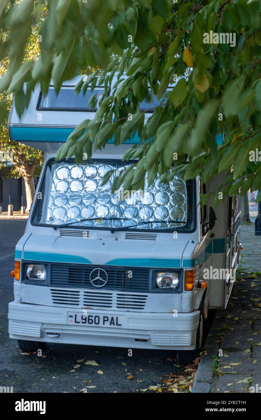 vintage Mercedes camper van or mobile home motorhome parked under a ...