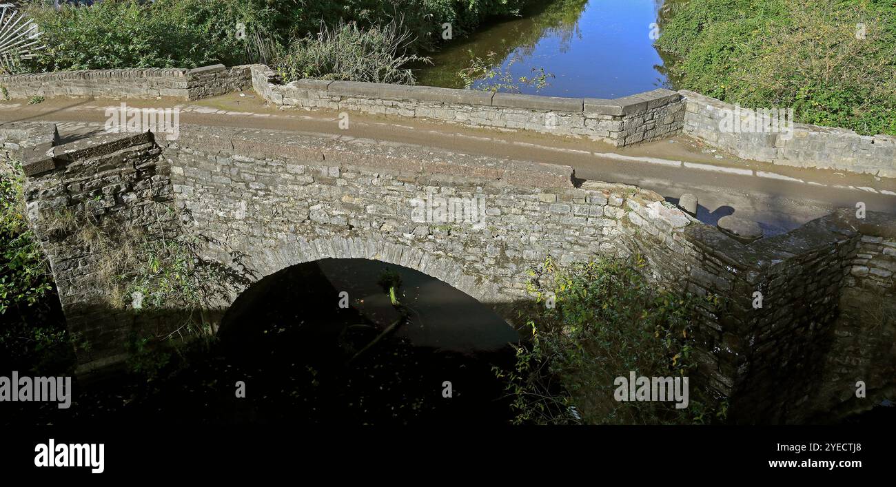 The old stone triple-arched Leckwith Bridge crosses the River Ely ...