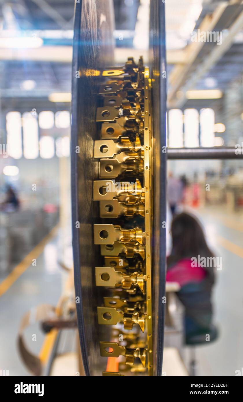 electric harnesses factory ,rolls of electric connectors, worker ...