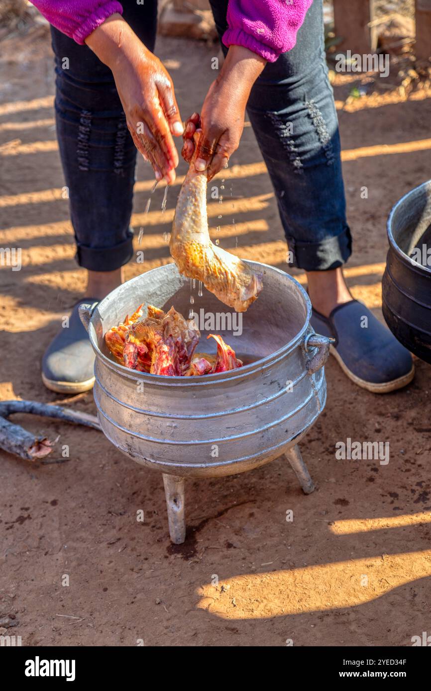 Man boiling meat in pot hi-res stock photography and images - Alamy