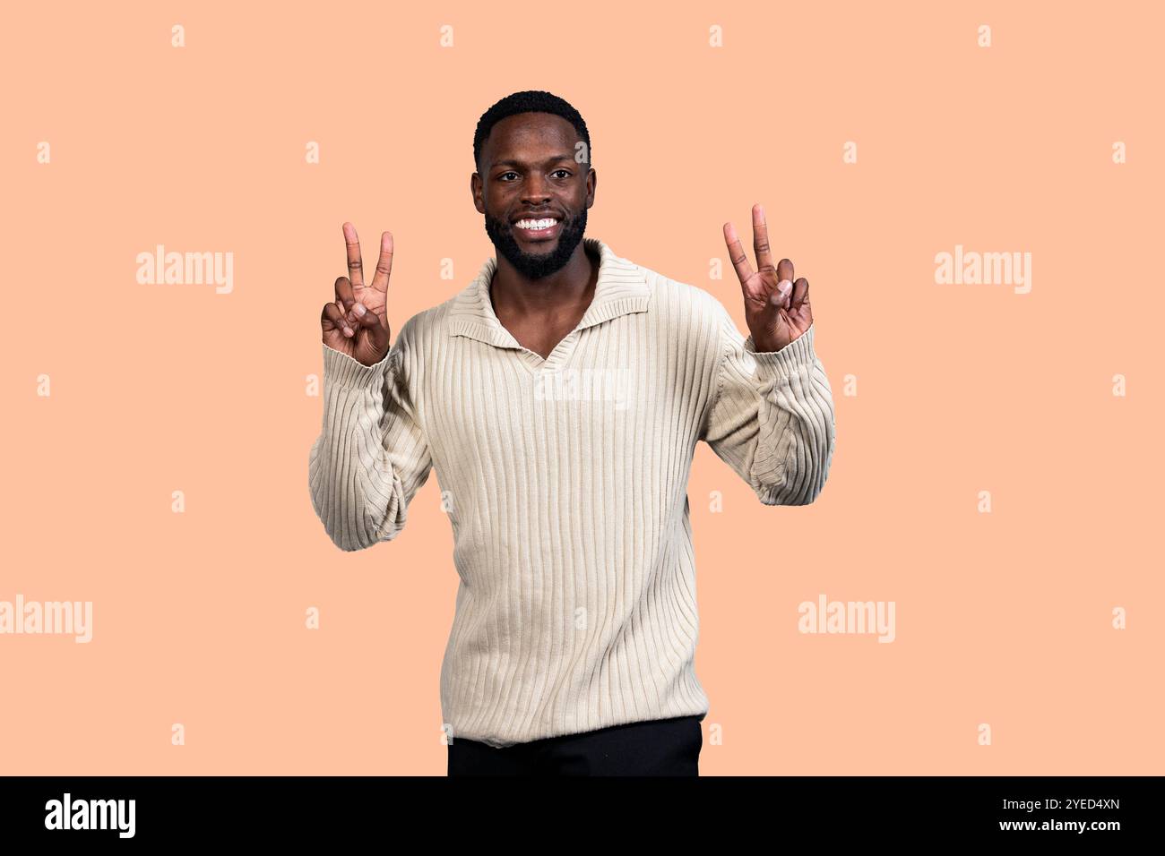 black man isolated on white background with victory sign Stock Photo ...